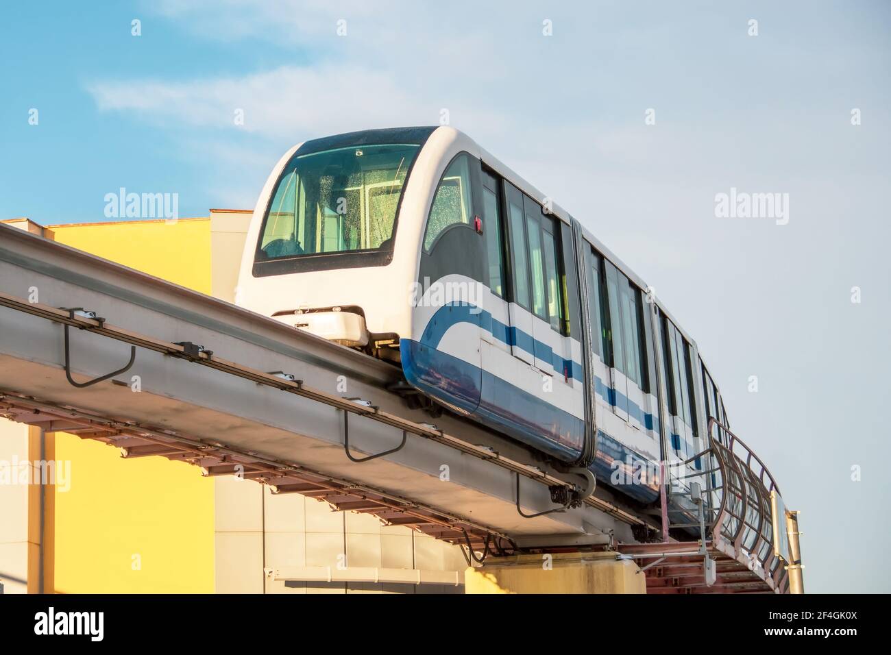 High speed subway train on the air bridge arrives at the station Stock ...