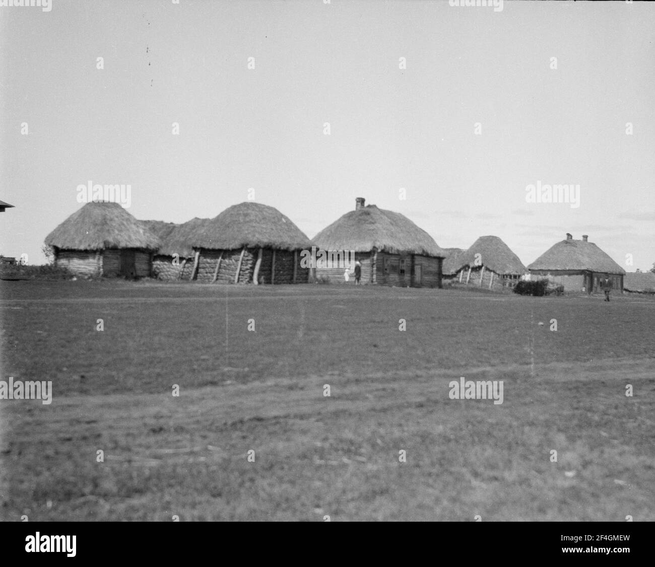 Thatched roof house thatched roof houses Black and White Stock Photos ...