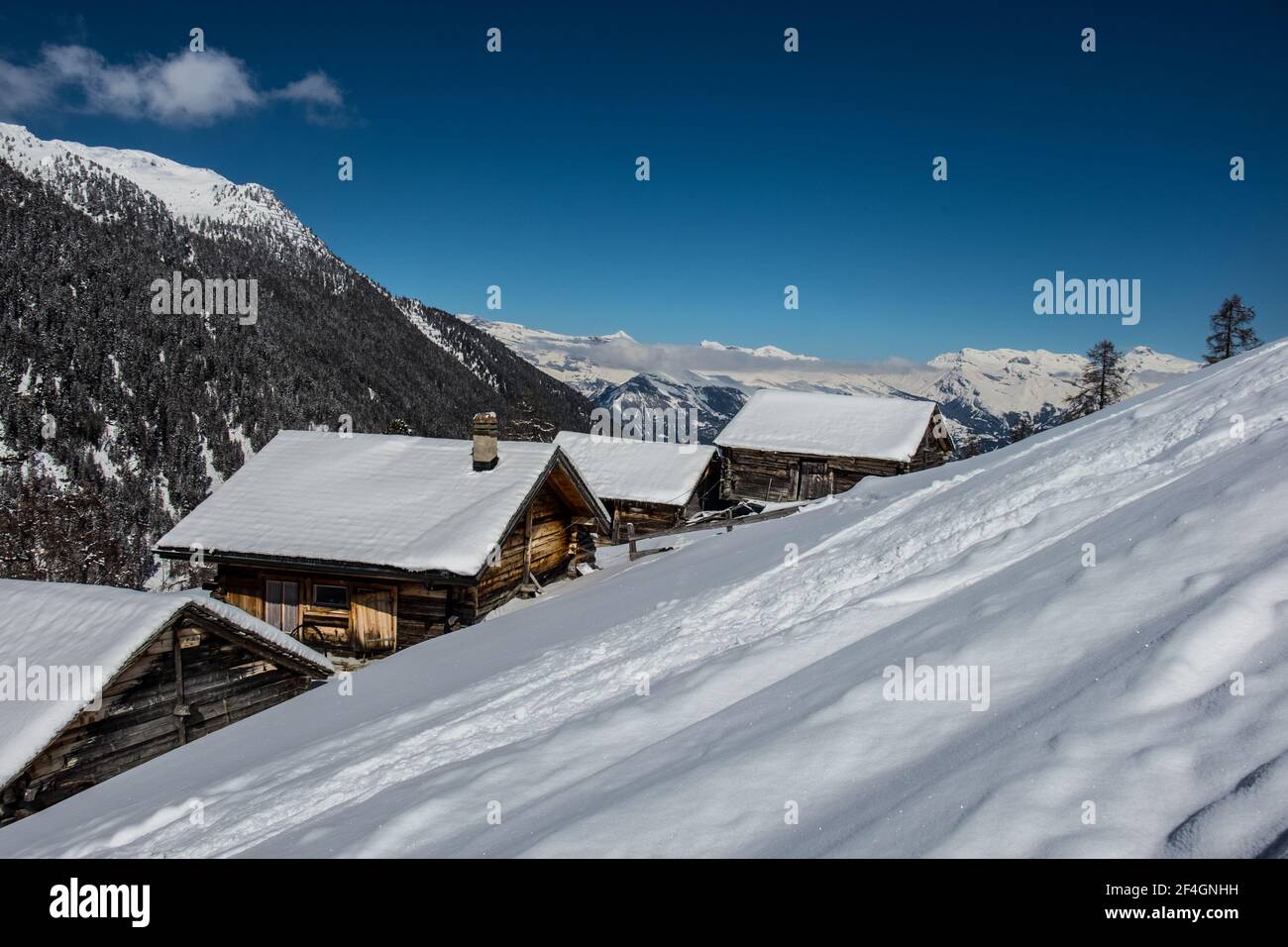 Landscape view of a typical mountain village, with chalets covered by ...