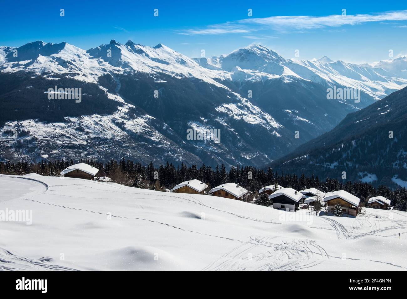Landscape view of a typical mountain village, with chalets covered by ...