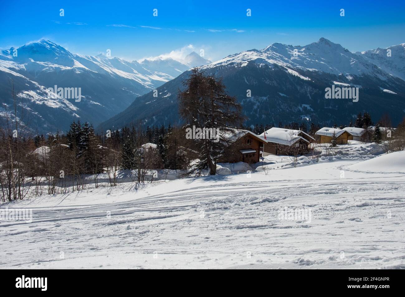 Landscape view of a typical mountain village, with chalets covered by ...