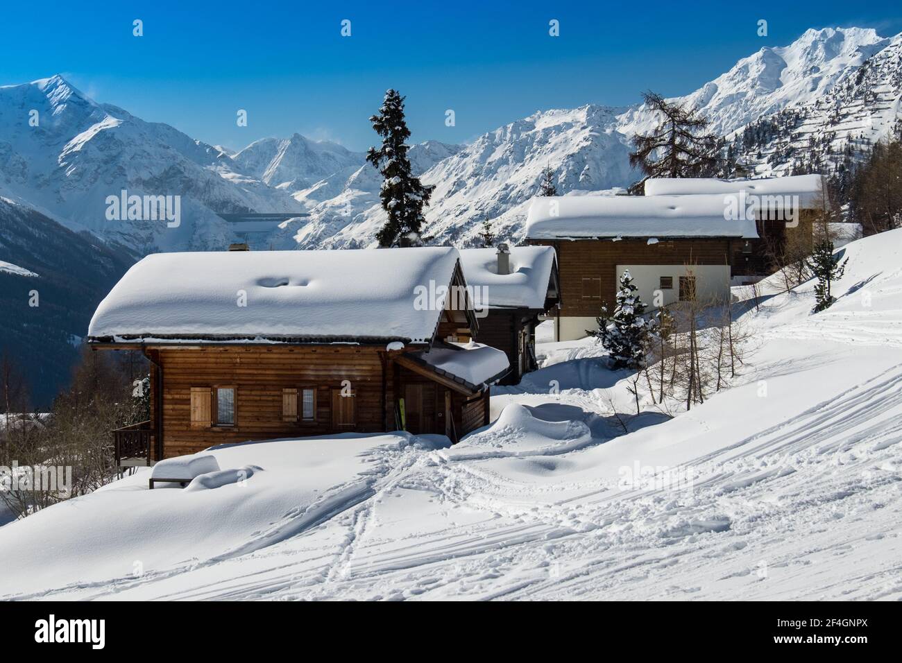Landscape view of a typical mountain village, with chalets covered by ...