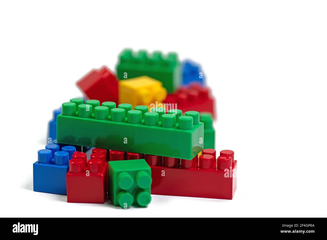 Colorful plastic building blocks against a white background Stock Photo ...