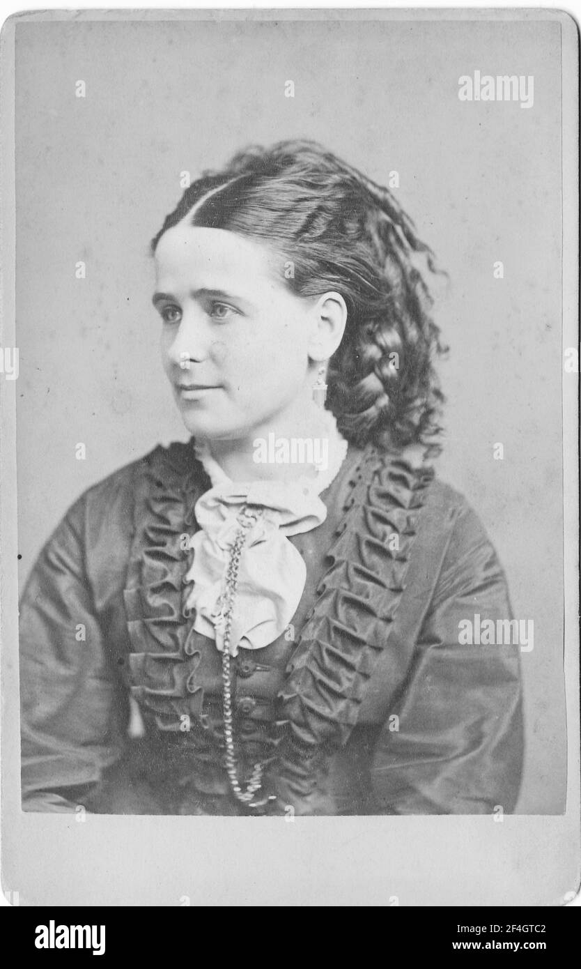 Cabinet photo with a three-quarter profile portrait of the Woman's ...