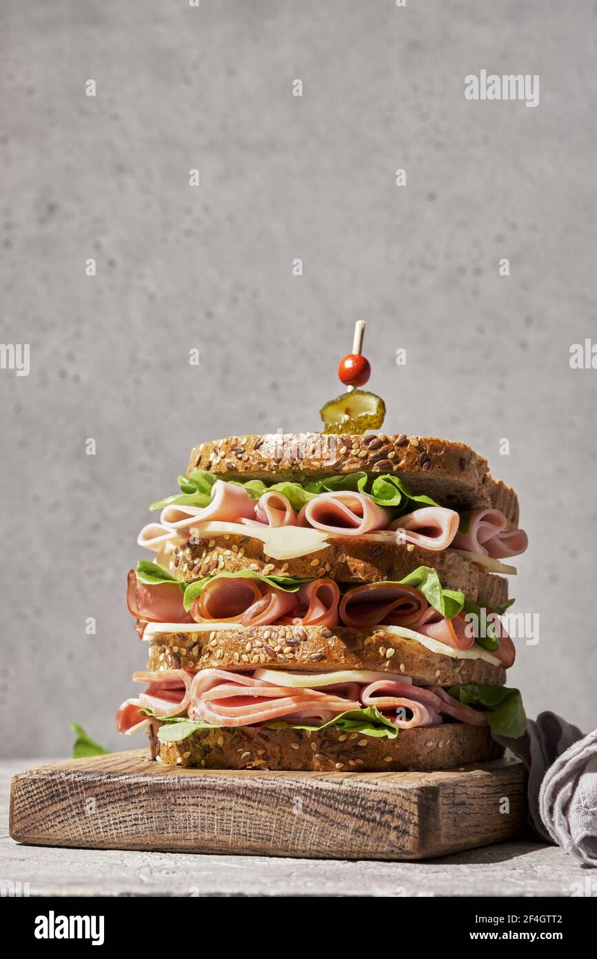 Fresh club sandwich with ham and cheese Stock Photo - Alamy