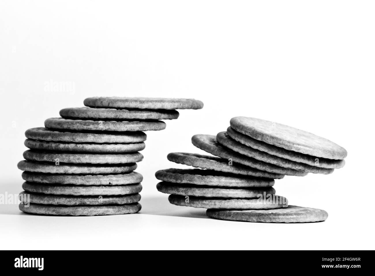 A grayscale shot of circular objects on top of each other on an ...