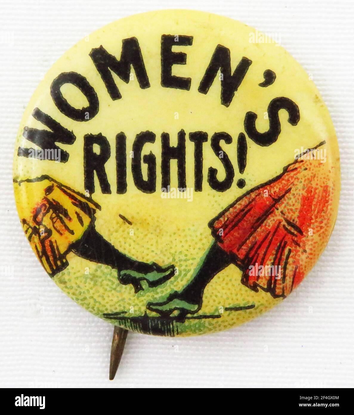 Anti-suffrage celluloid pin or button, with a colorful image of female ...