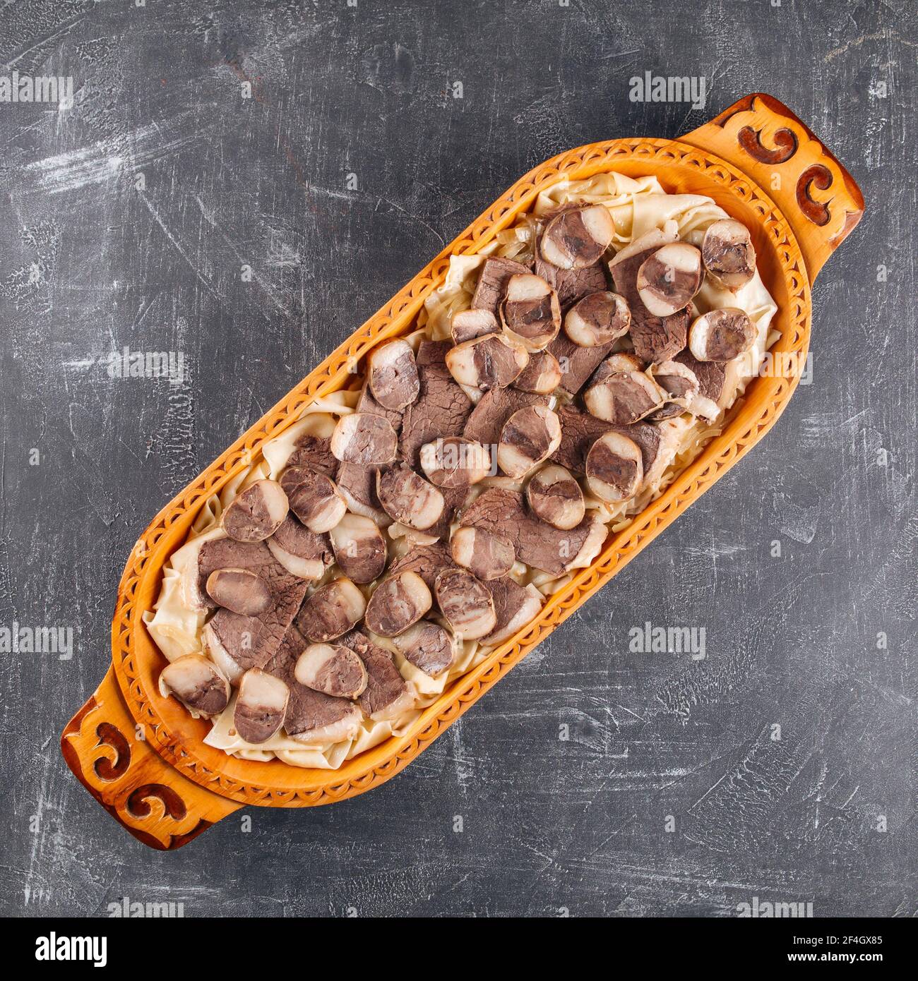 Kazakh national festive appetizer kazy horse meat Stock Photo - Alamy