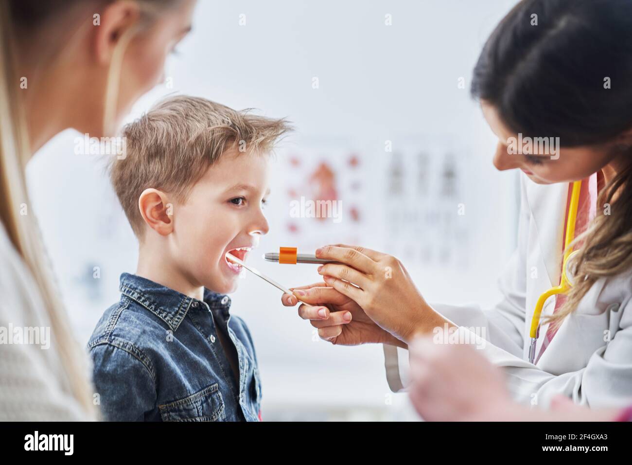 Little boy having medical examination by pediatrician Stock Photo - Alamy