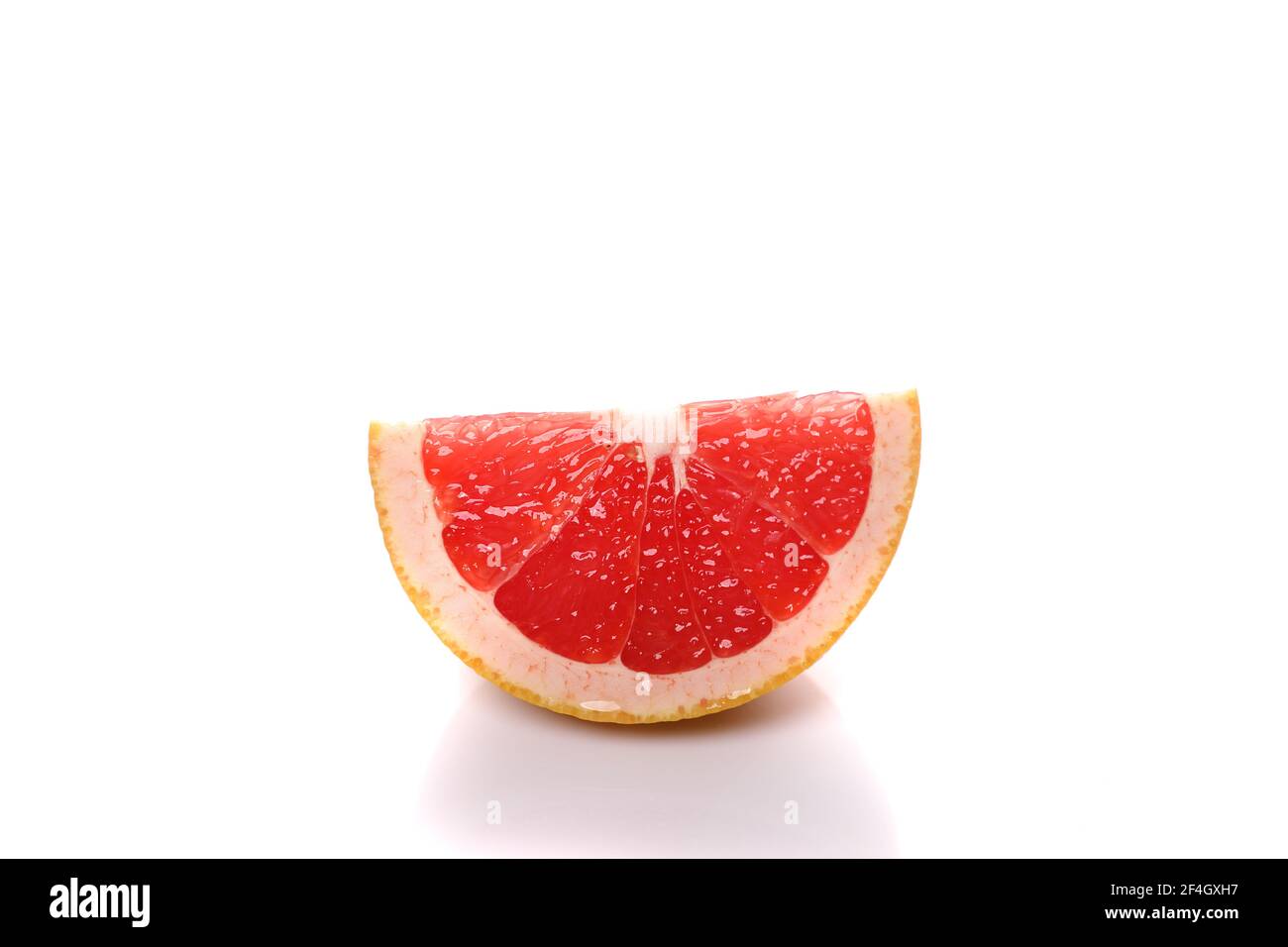 Grapefruit sliced isolated in white background Stock Photo - Alamy