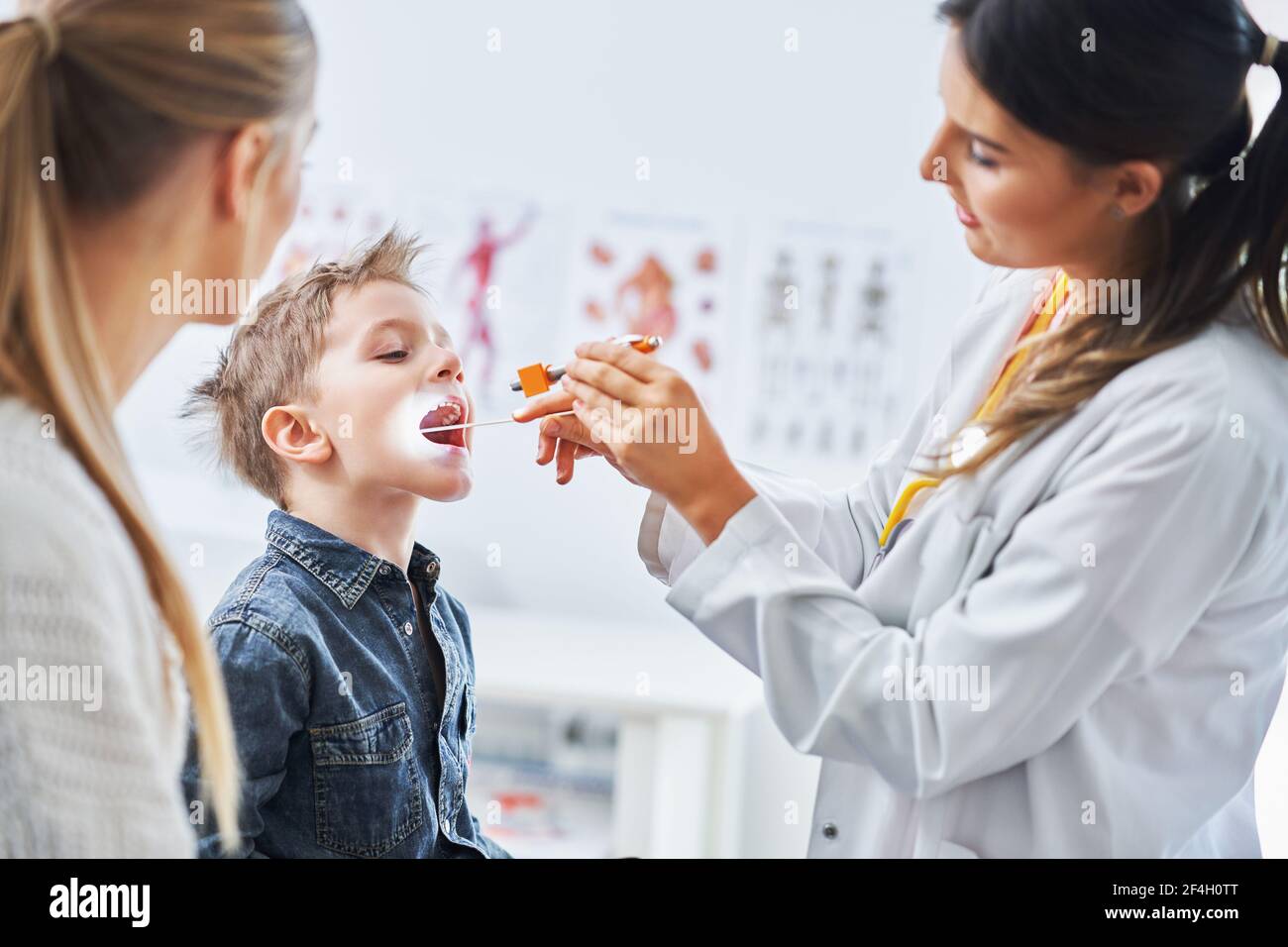 Little boy having medical examination by pediatrician Stock Photo - Alamy