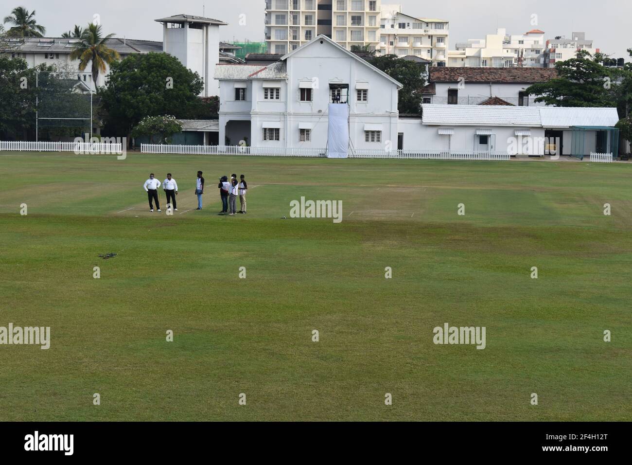 A match about to start. Picturistic school cricket ground. St. Thomas ...