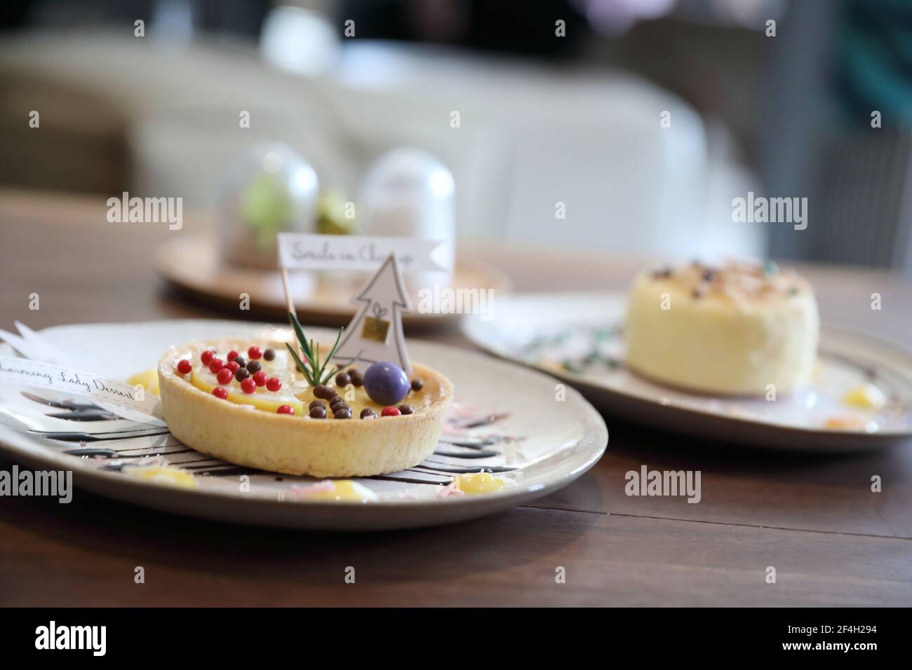 Lemon tart pie topping with chocolate ball sweet dessert on wood ...