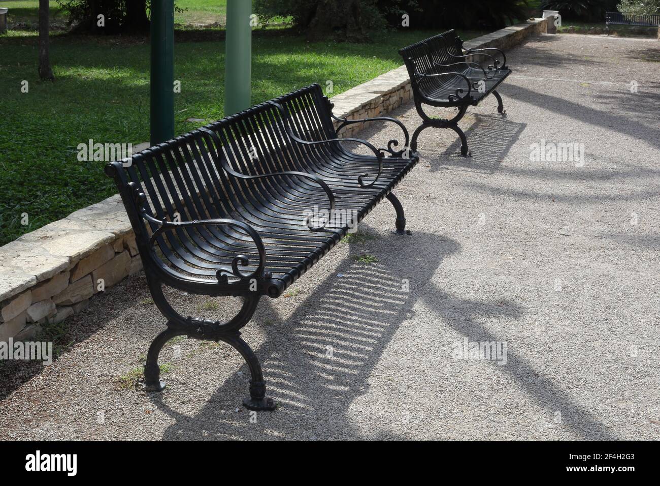 metal benches in the street Stock Photo - Alamy