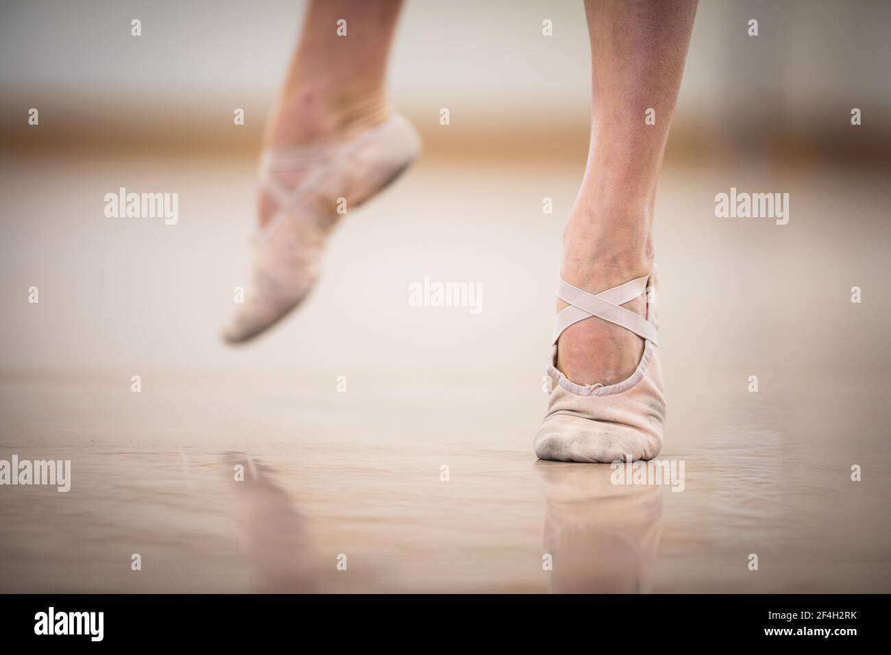 Legs and slippers of classical ballet dancers rehearsing Stock Photo ...