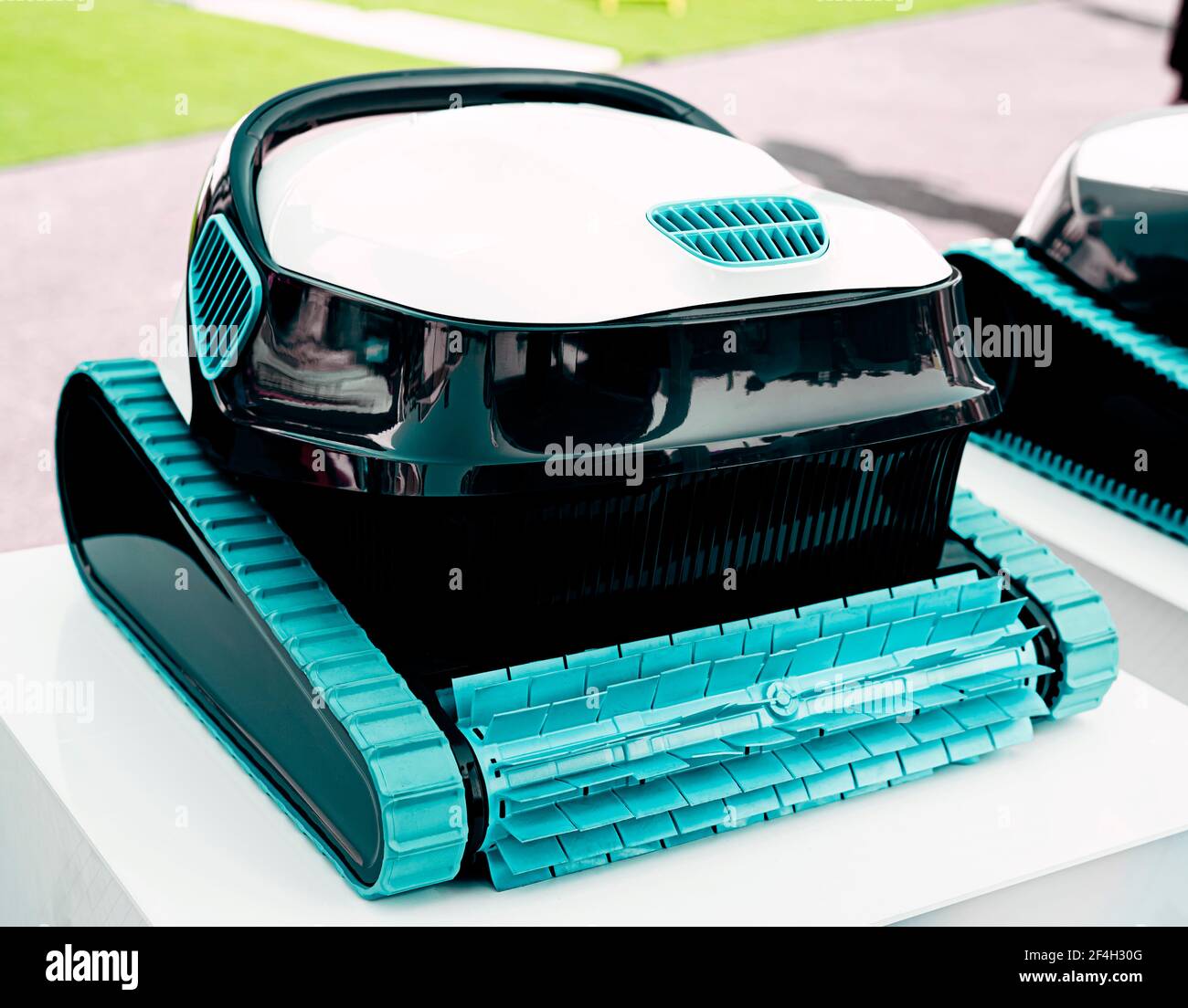 Automatic robot pool cleaners. Swimming Pool Maintenance Stock Photo ...