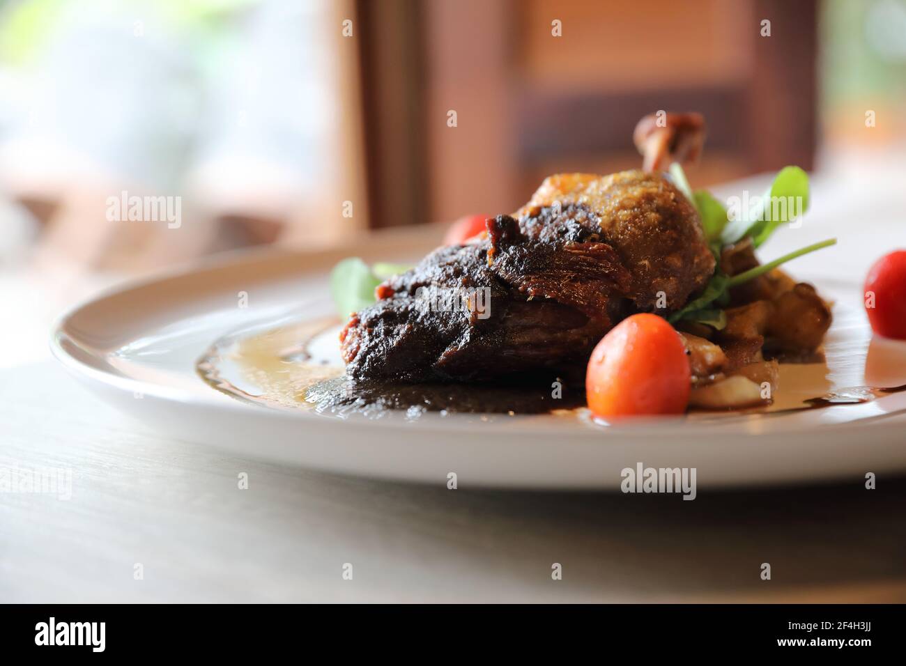 duck confit , Roasted Duck leg French food Stock Photo - Alamy