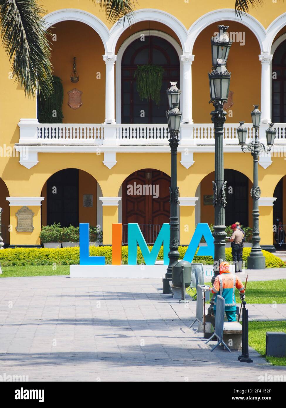 Lima city sign at main square in front of the city hall facade. The ...