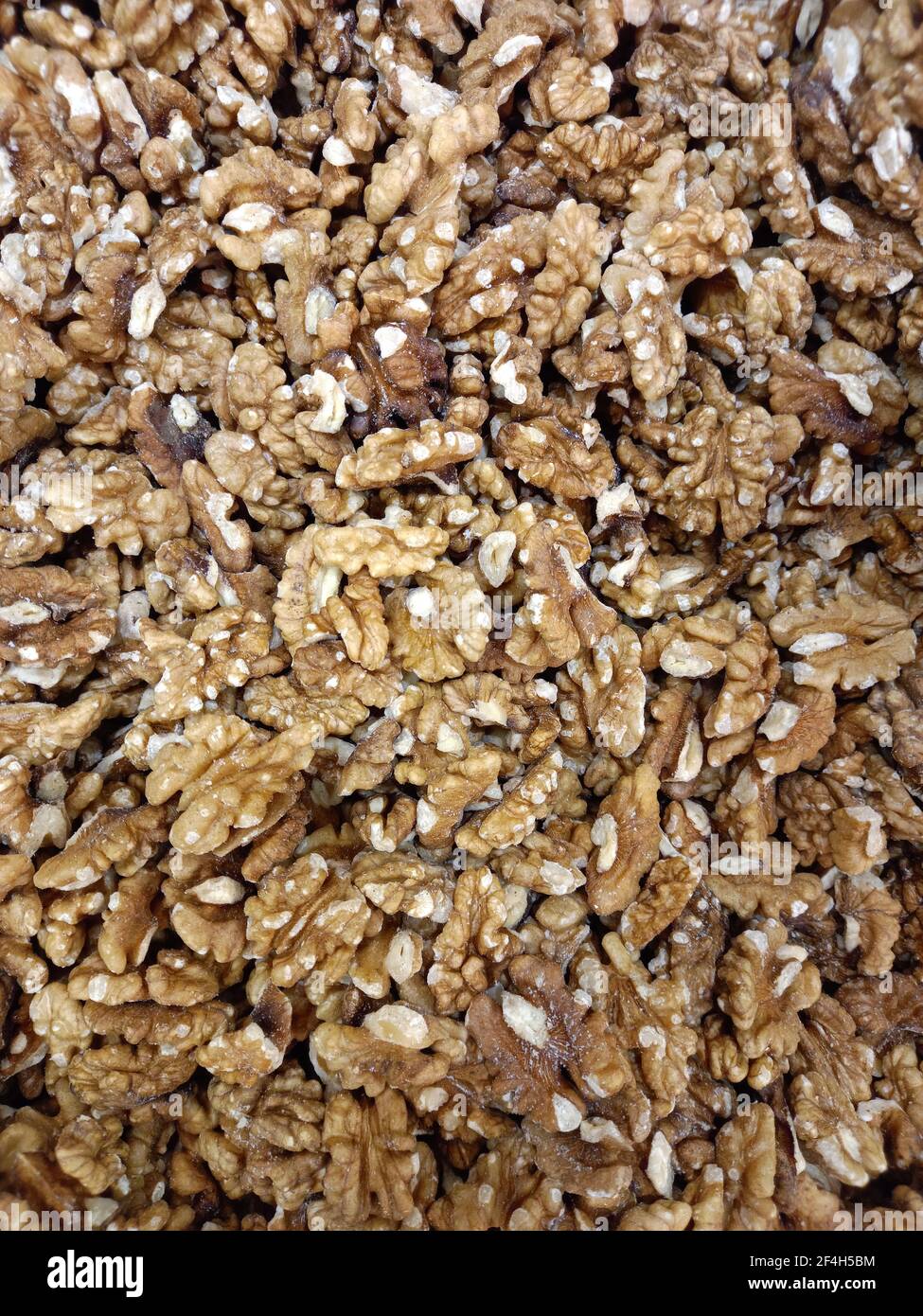 Walnut. The background is made of peeled walnuts. Full frame Stock ...