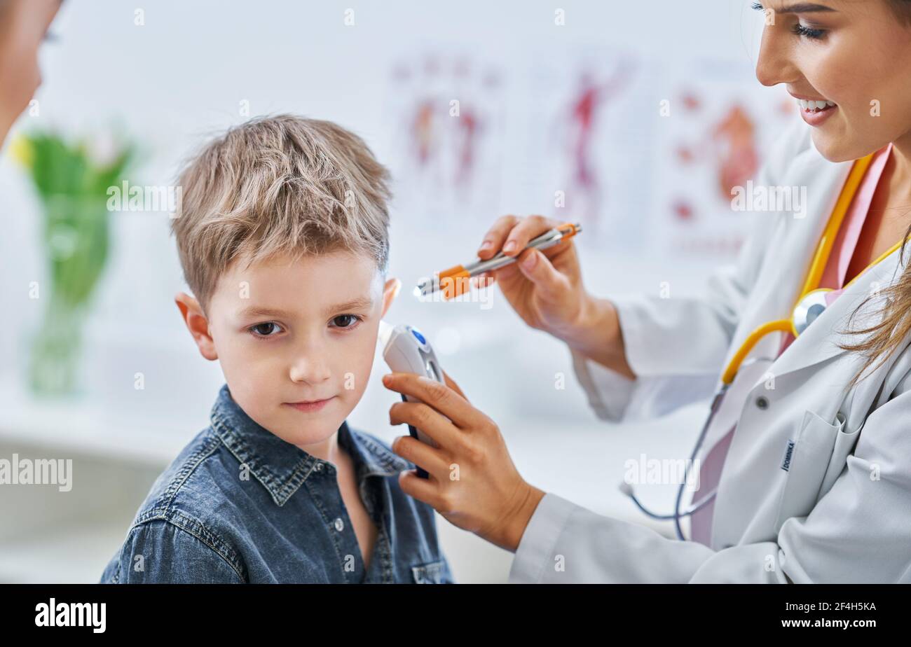 Little boy having medical examination by pediatrician Stock Photo - Alamy