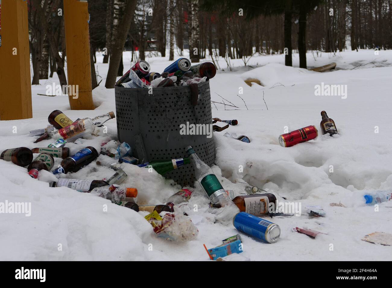 Garbage dump in the park. Dirt and pollution with plastic, aluminum and ...