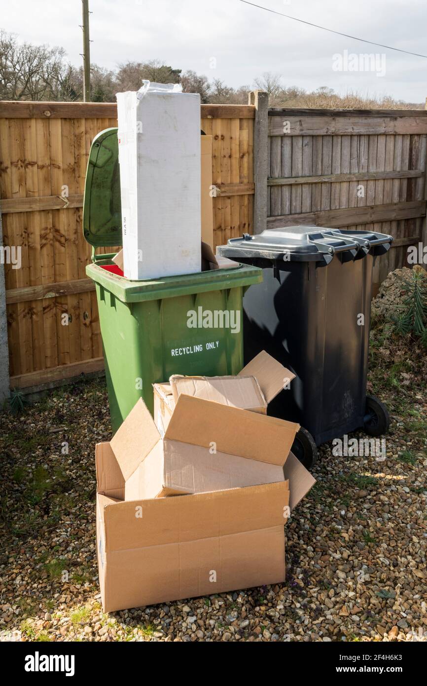Cardboard boxes for recycling are accumulating as people receive ...