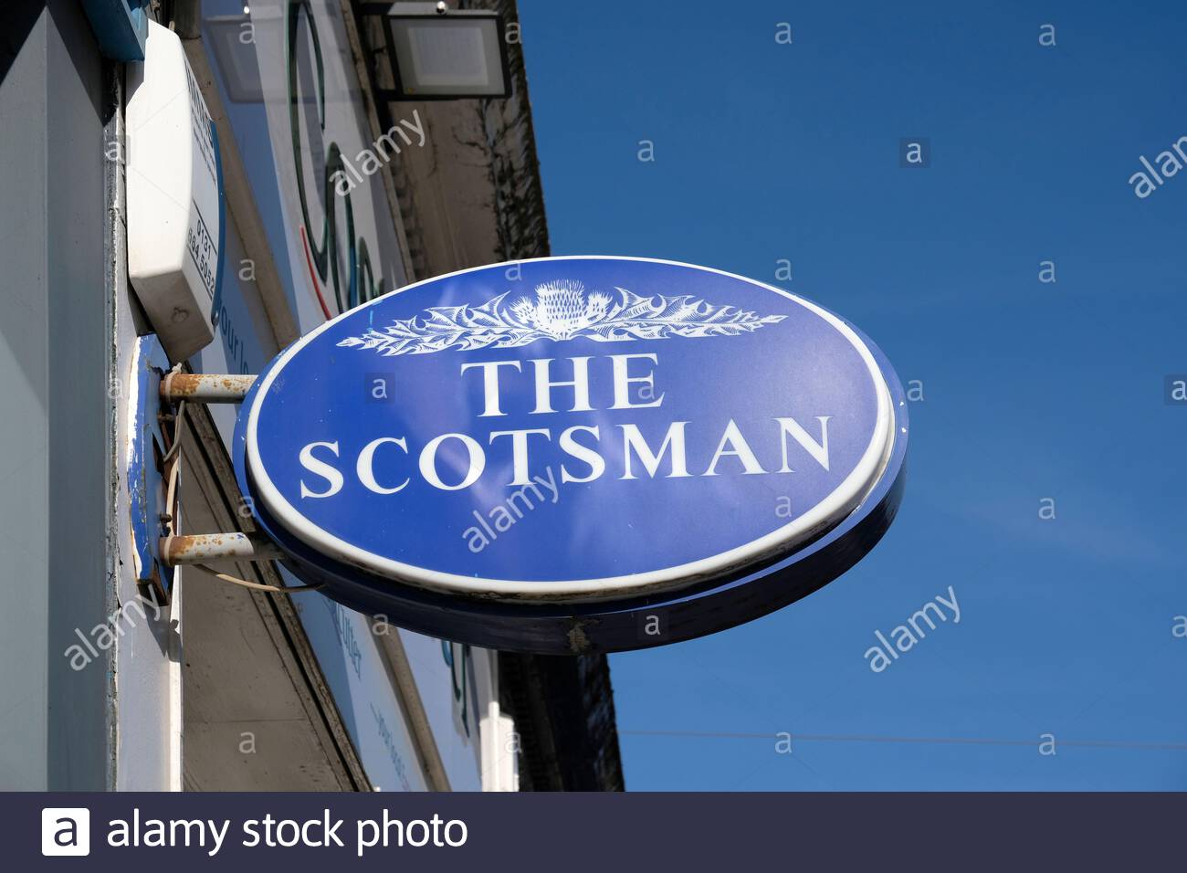 Scotsman Newspaper for sale shop sign Stock Photo - Alamy