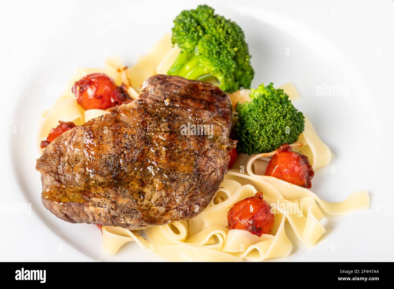overview of a grilled steak on wood Stock Photo - Alamy