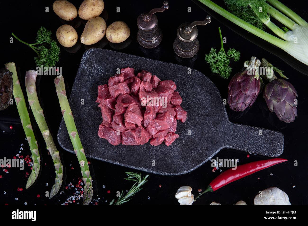 Fresh veal ( kusbasi et ). beef cubes on black background Stock Photo ...