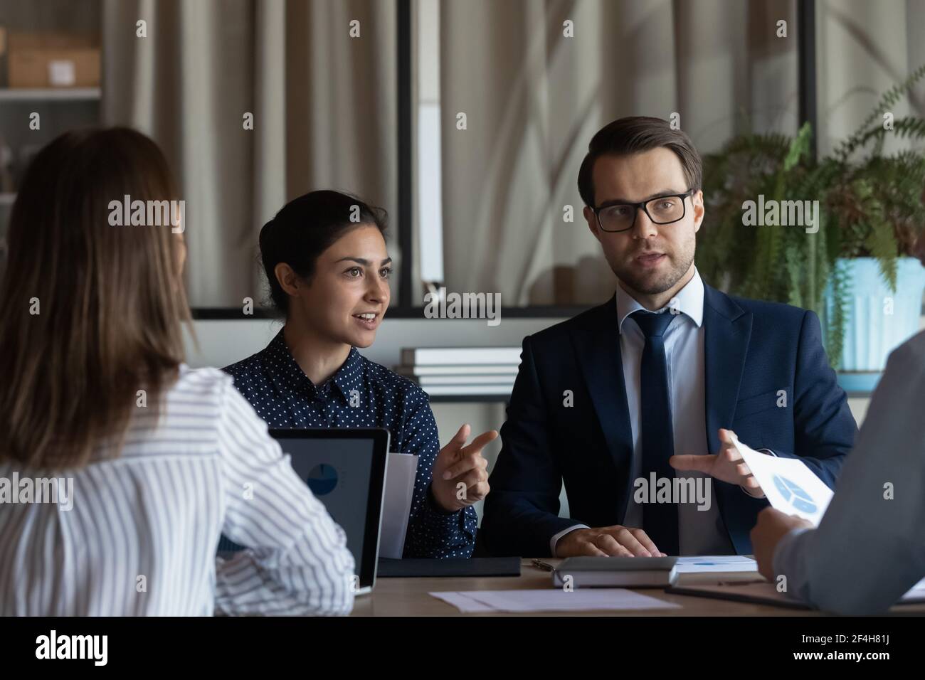 Multiethnic marketing team brainstorming ideas hi-res stock photography ...