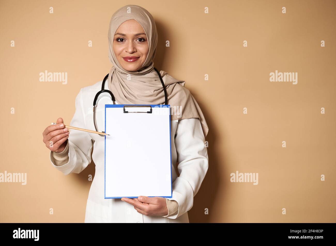 Cute muslim female doctor presentation hi-res stock photography and ...