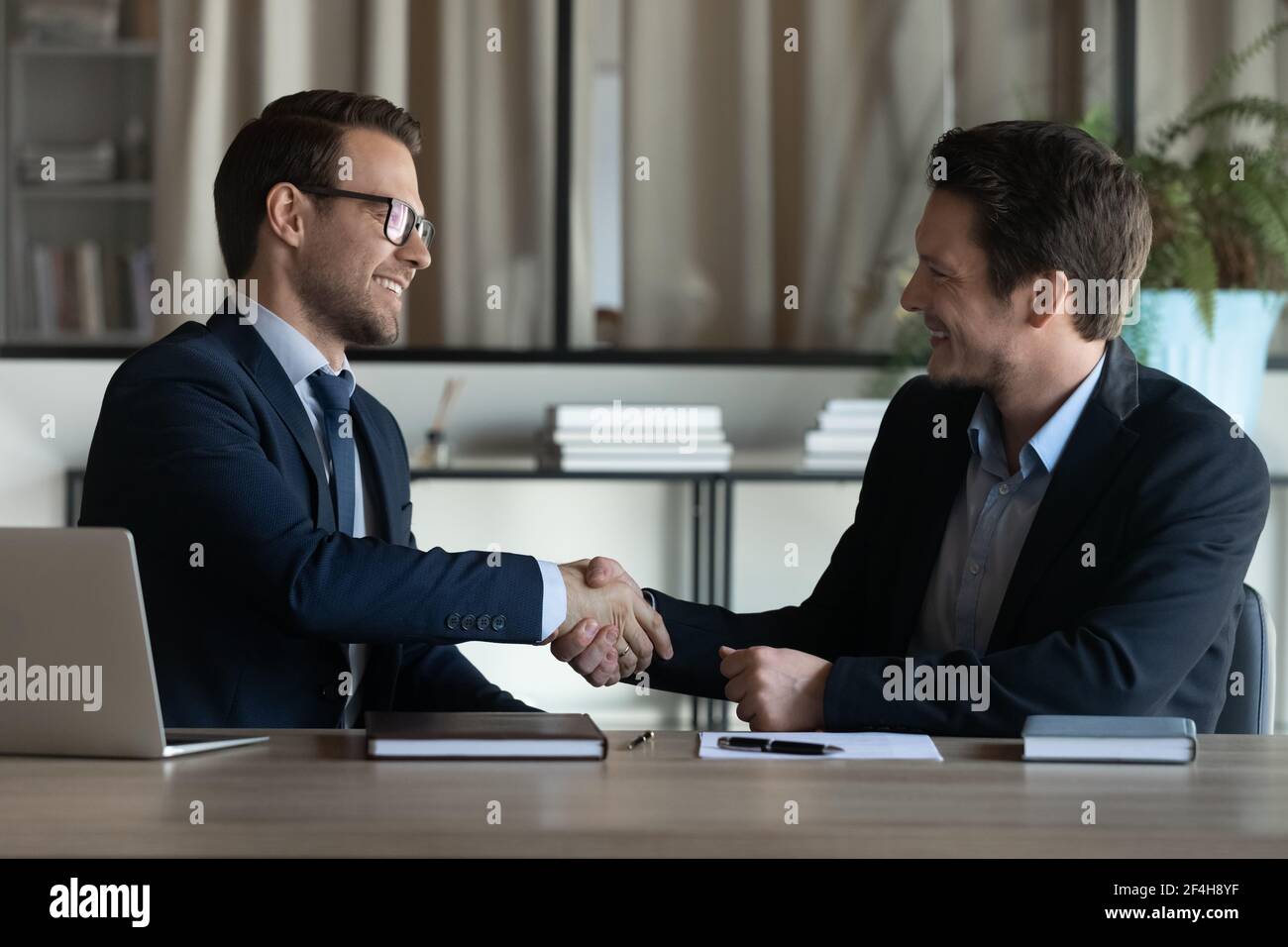 Businessmen insure hi-res stock photography and images - Alamy