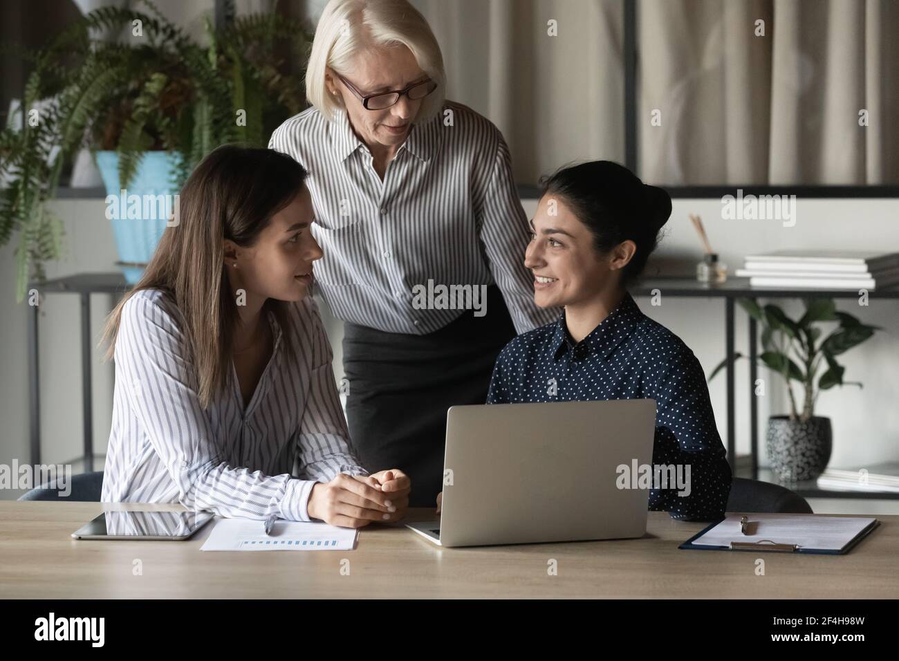 Office diverse female colleagues hi-res stock photography and images ...