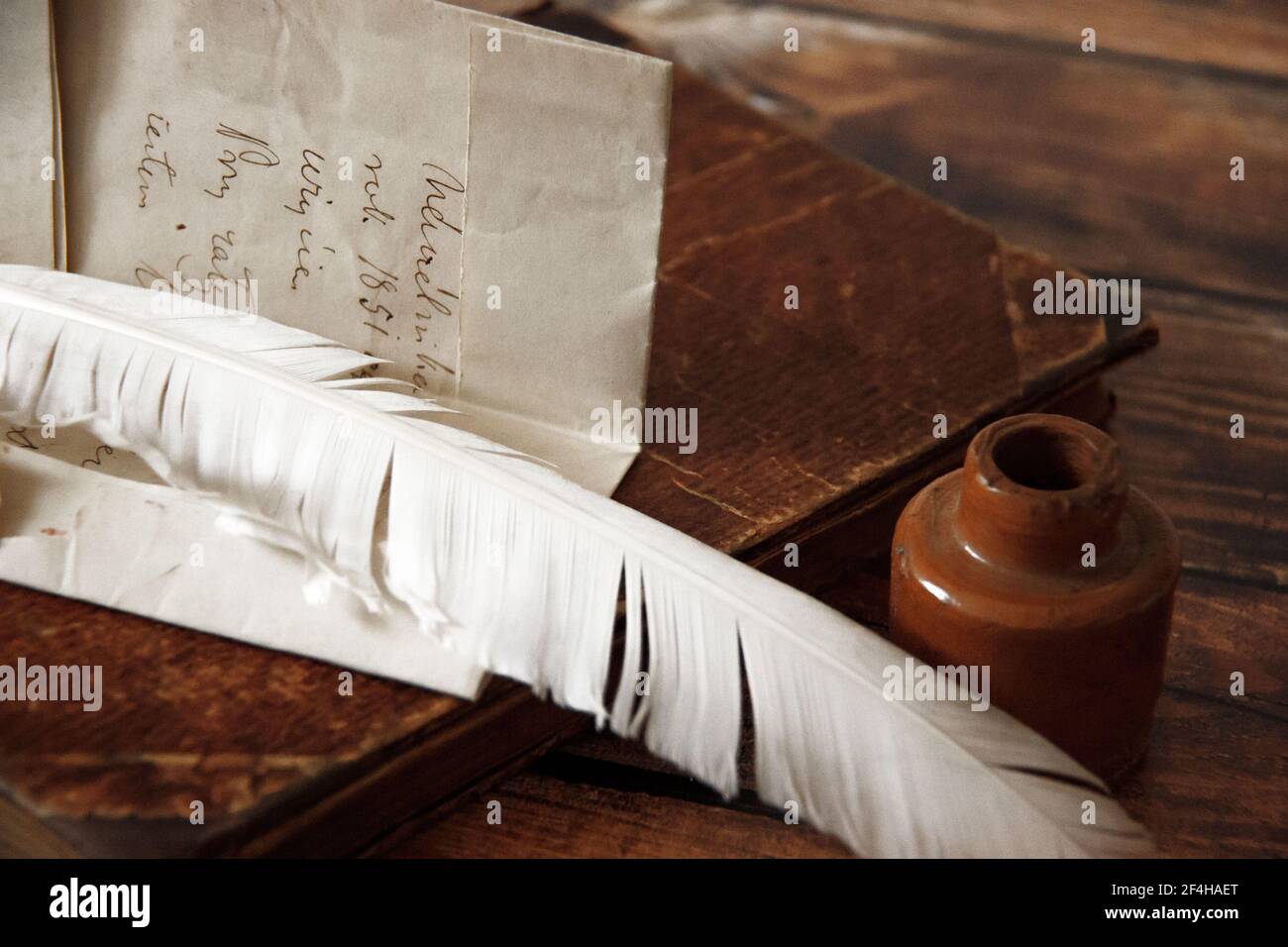Old vintage handwritten letter with inkwell and feather Stock Photo - Alamy