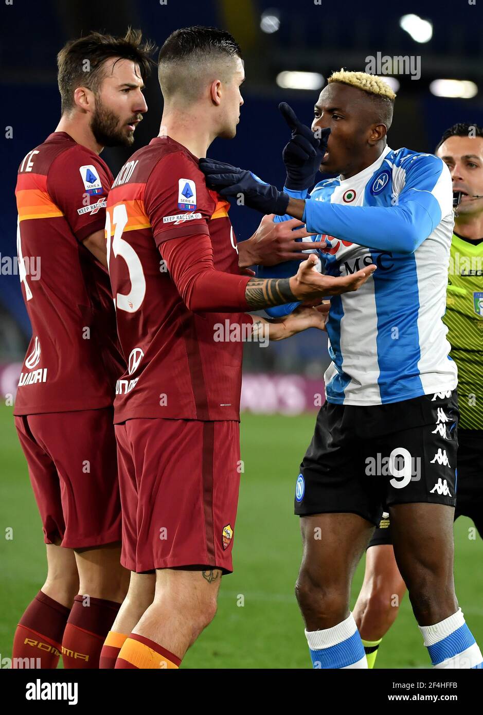 Rome, Italy. 21st Mar, 2021. Victor Osimhen of SSC Napoli (R) argues ...
