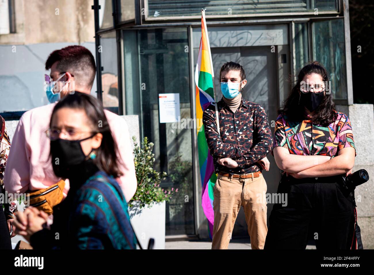 A protester holding the LGBT flag during the World Against Racism ...