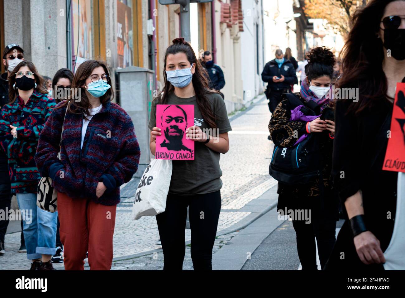A protester holding a placard in honour of Bruno Candé a Portuguese ...