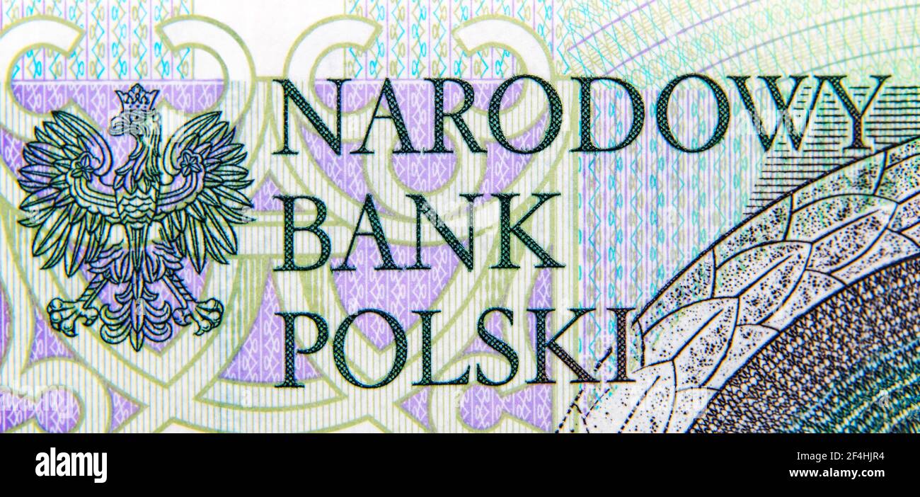 Polish National Bank sign on one hundred zloty banknote. Macro shot ...
