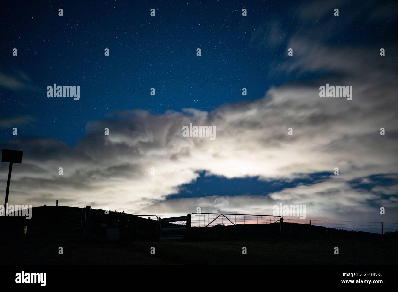 Cloudy night with hidden sparkly stars Stock Photo - Alamy