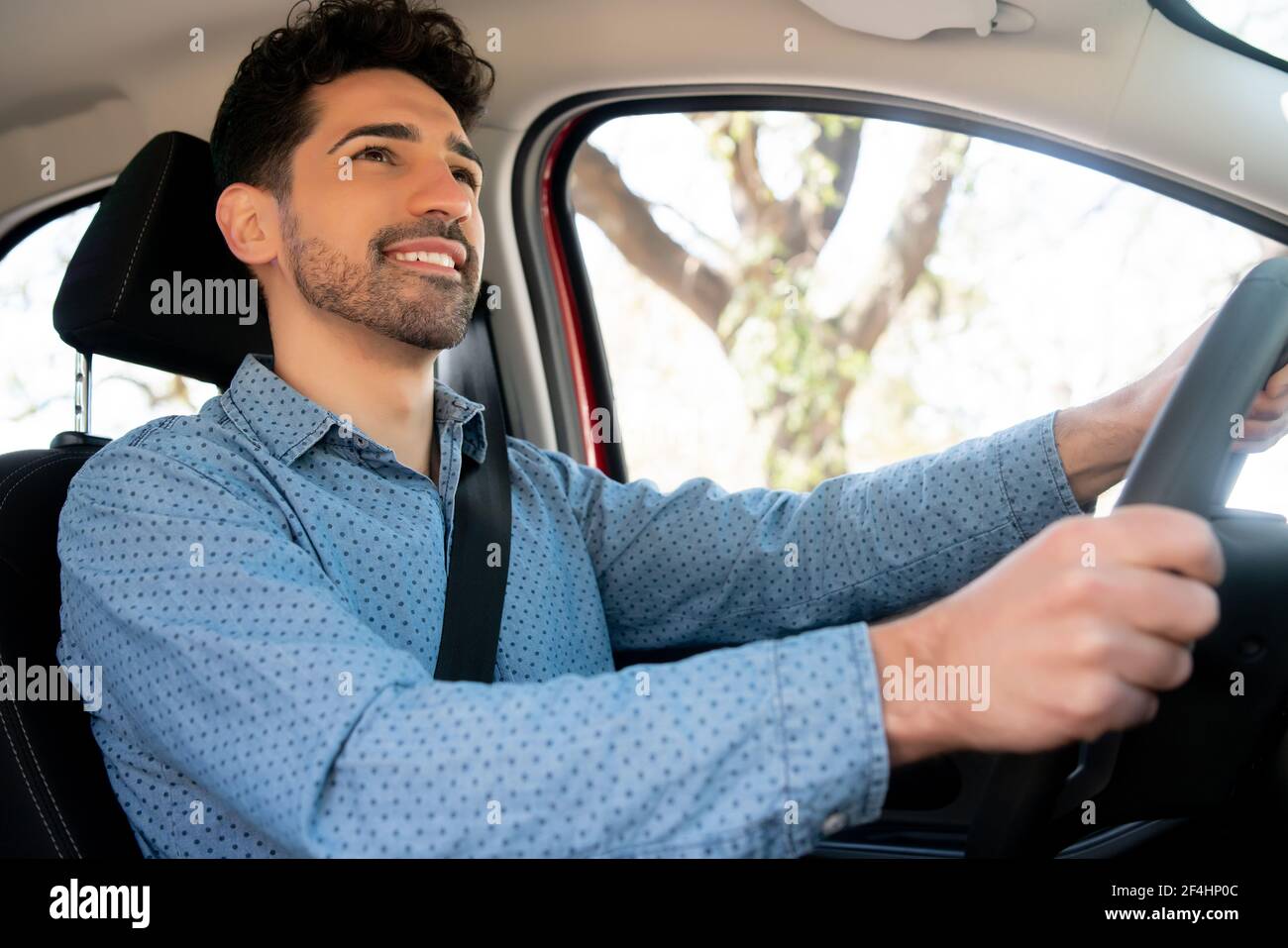 Man drive car on city hi-res stock photography and images - Alamy