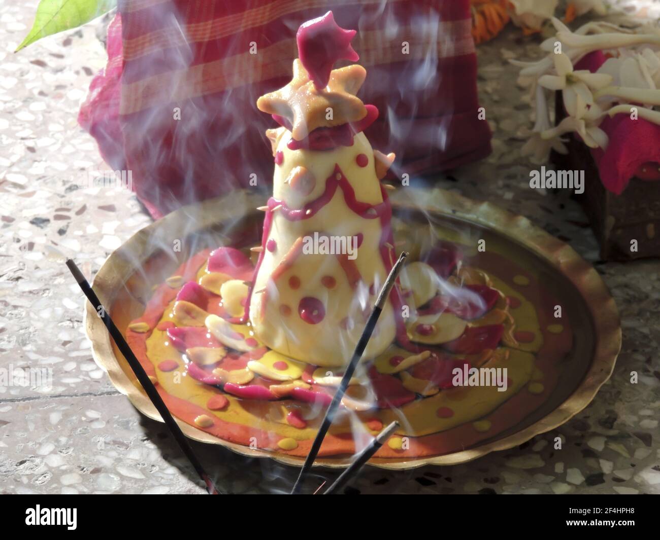 A closeup of a Bengali wedding shree on the ground Stock Photo - Alamy