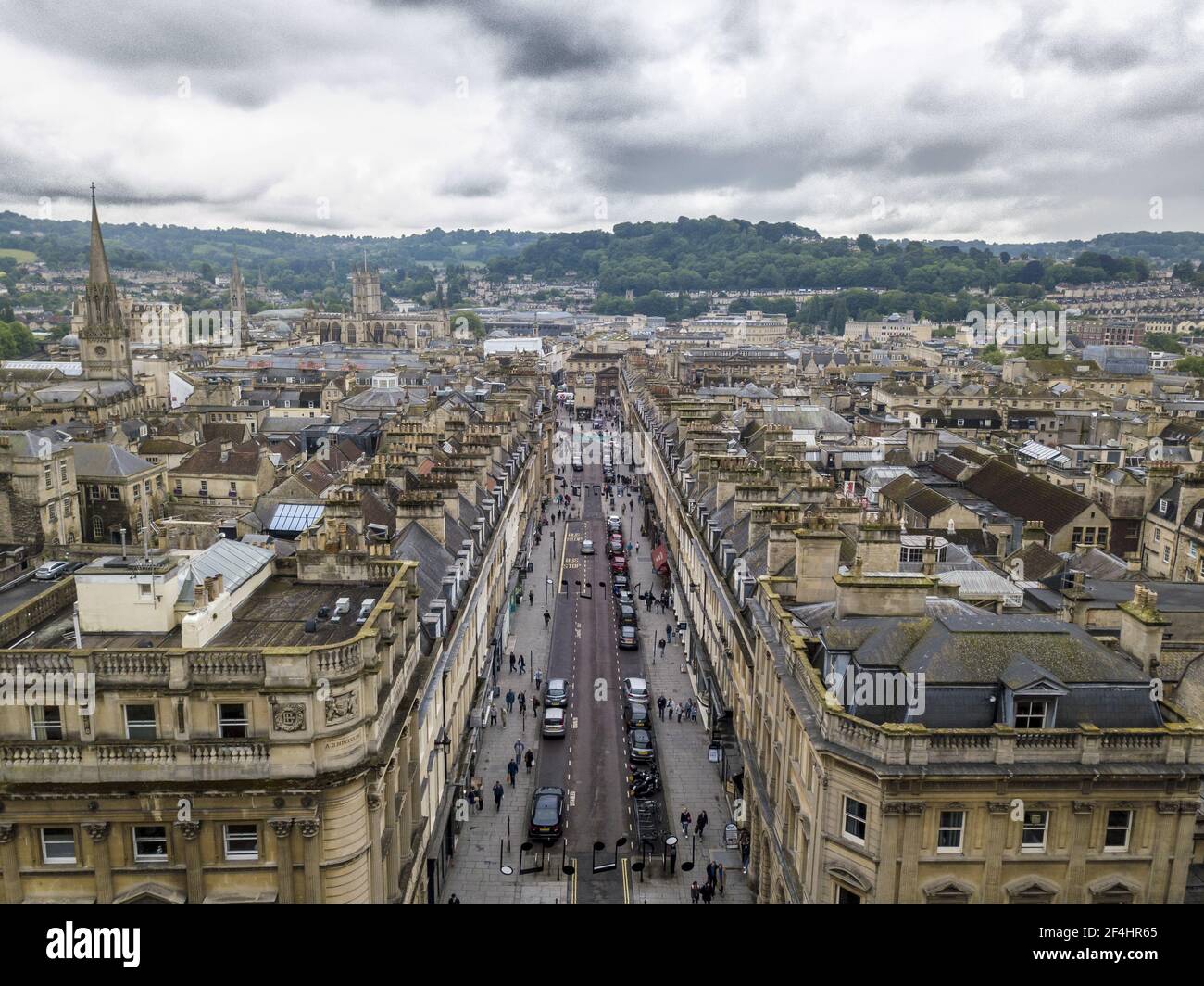 An aerial view of a beautiful cityscape with roads, buildings, cars ...