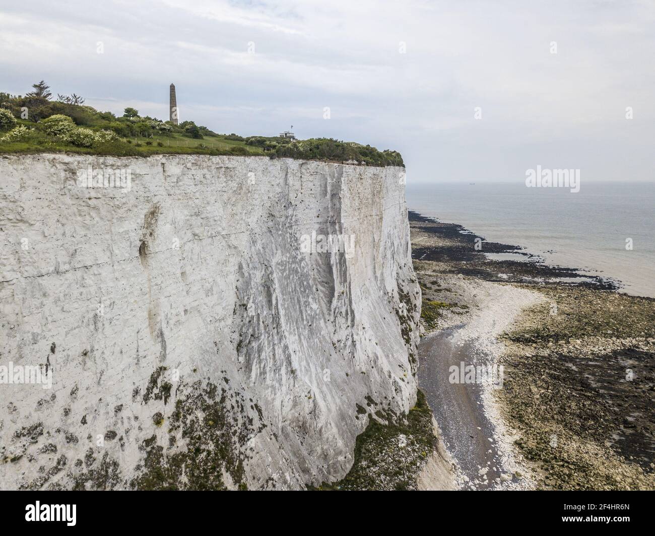 The ocean view of the city and coastline by the steep cliff in Dover ...