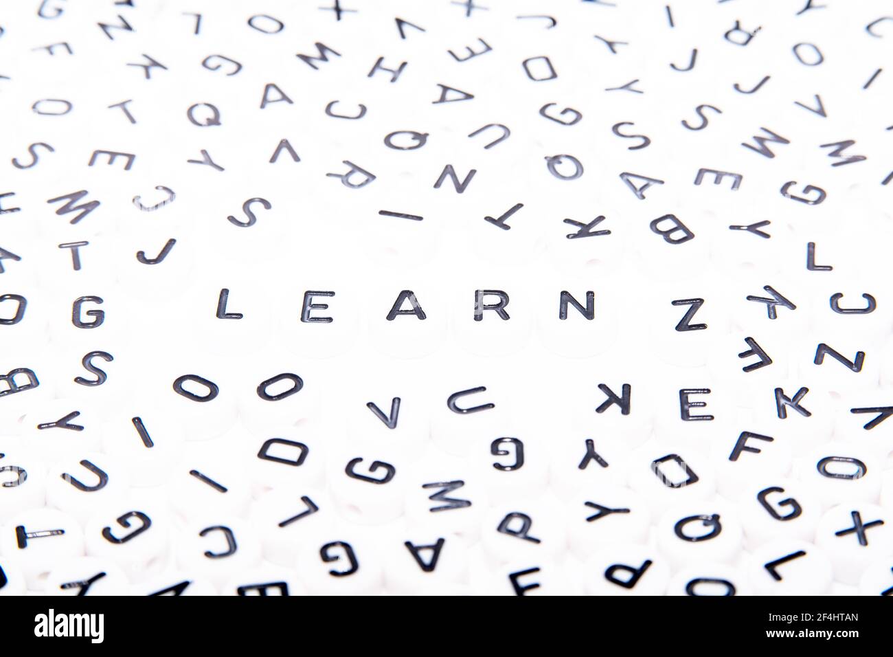 Faded Learn Word In A Sea Of Letters Stock Photo Alamy