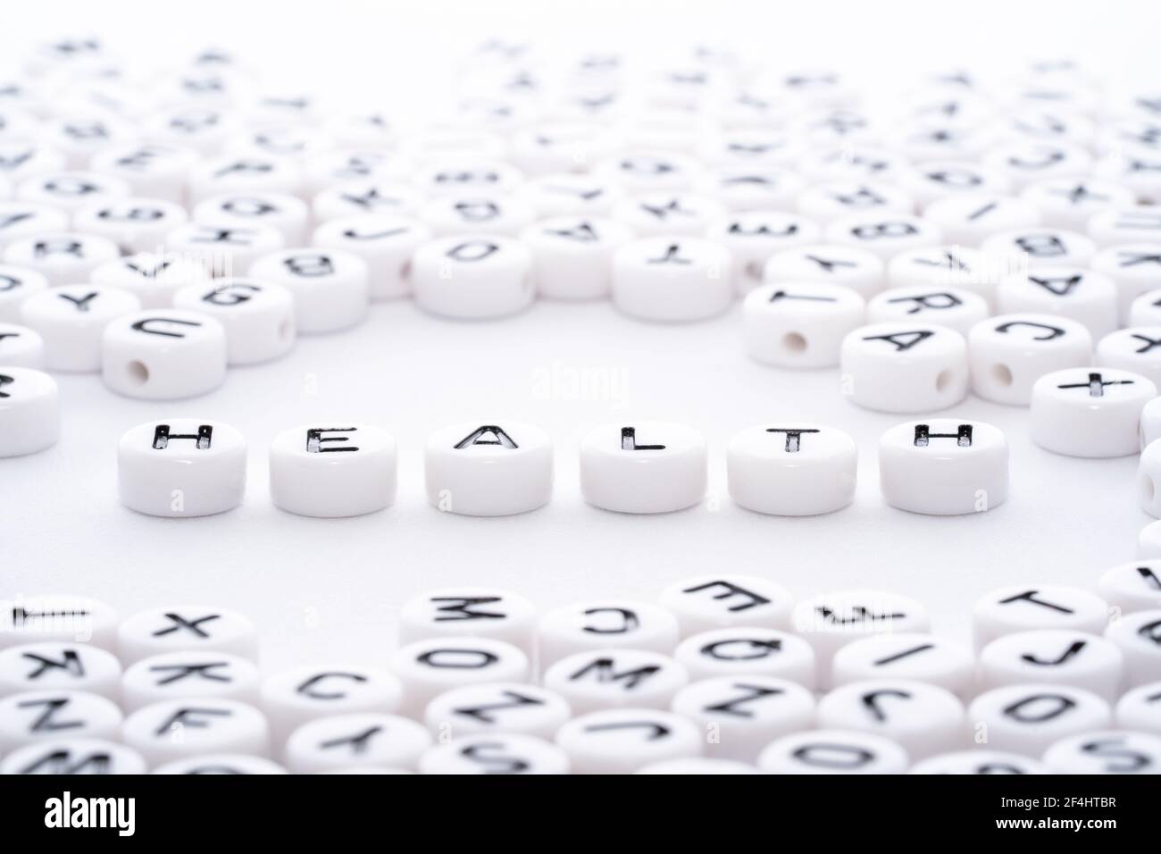Health word written on a block of white alphabets Stock Photo - Alamy