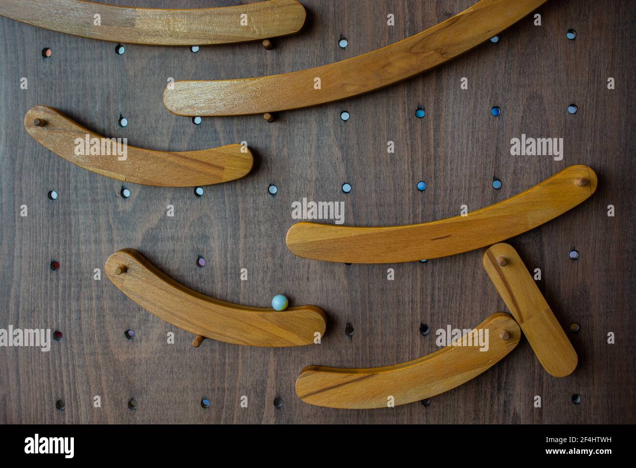 Concept of creative logical thinking. Wooden blocks. Geometric shapes ...