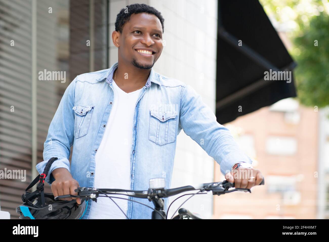 Man walking with helmet hi-res stock photography and images - Alamy