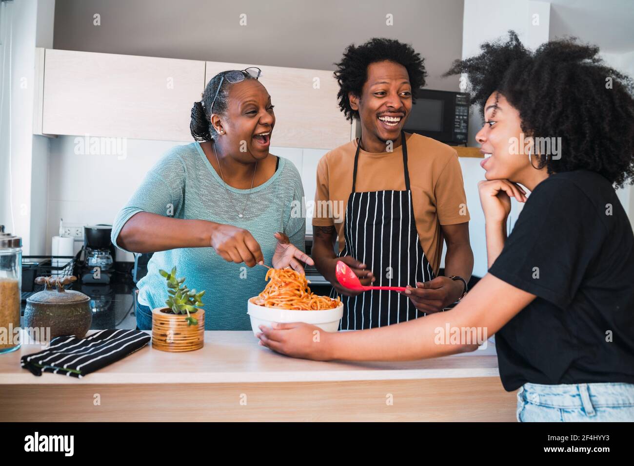 Preparing meal together mother hi-res stock photography and images - Alamy
