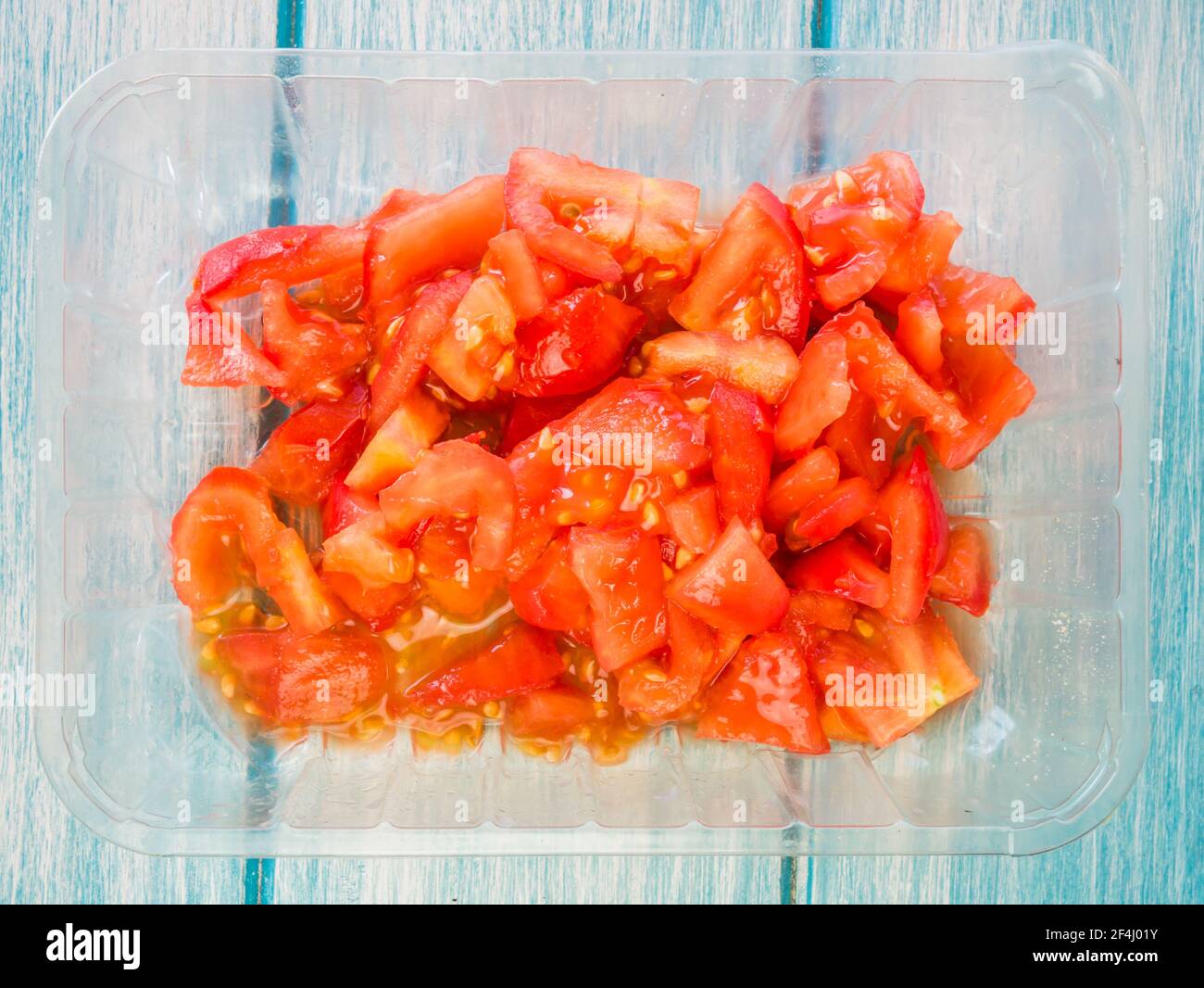Chopped tomatoes in container hi-res stock photography and images - Alamy