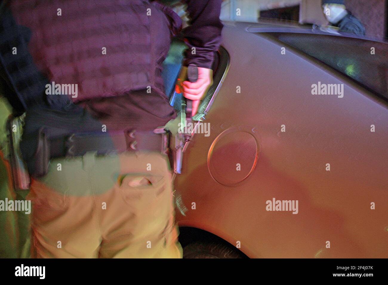 Police officer draws gun hi-res stock photography and images - Alamy